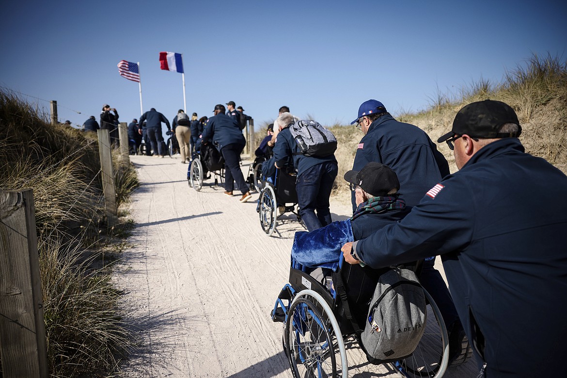 'It was tough': World War II veterans return to Utah Beach to mark D ...