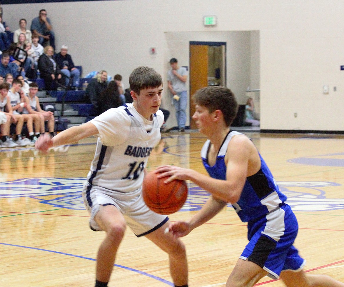 PREP BASKETBALL: Badgers sweep Orofino Maniacs, girls down Kellogg ...
