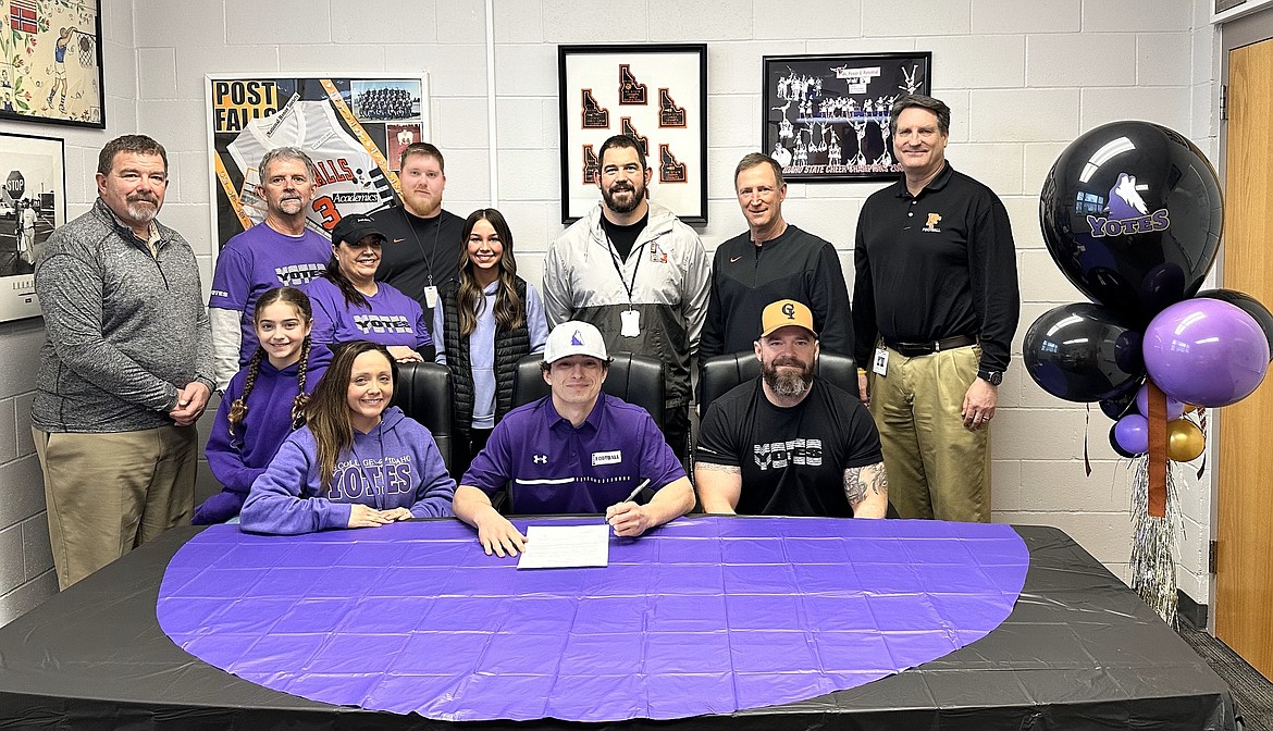 Signing photos Feb. 15, 2024 | Coeur d'Alene Press
