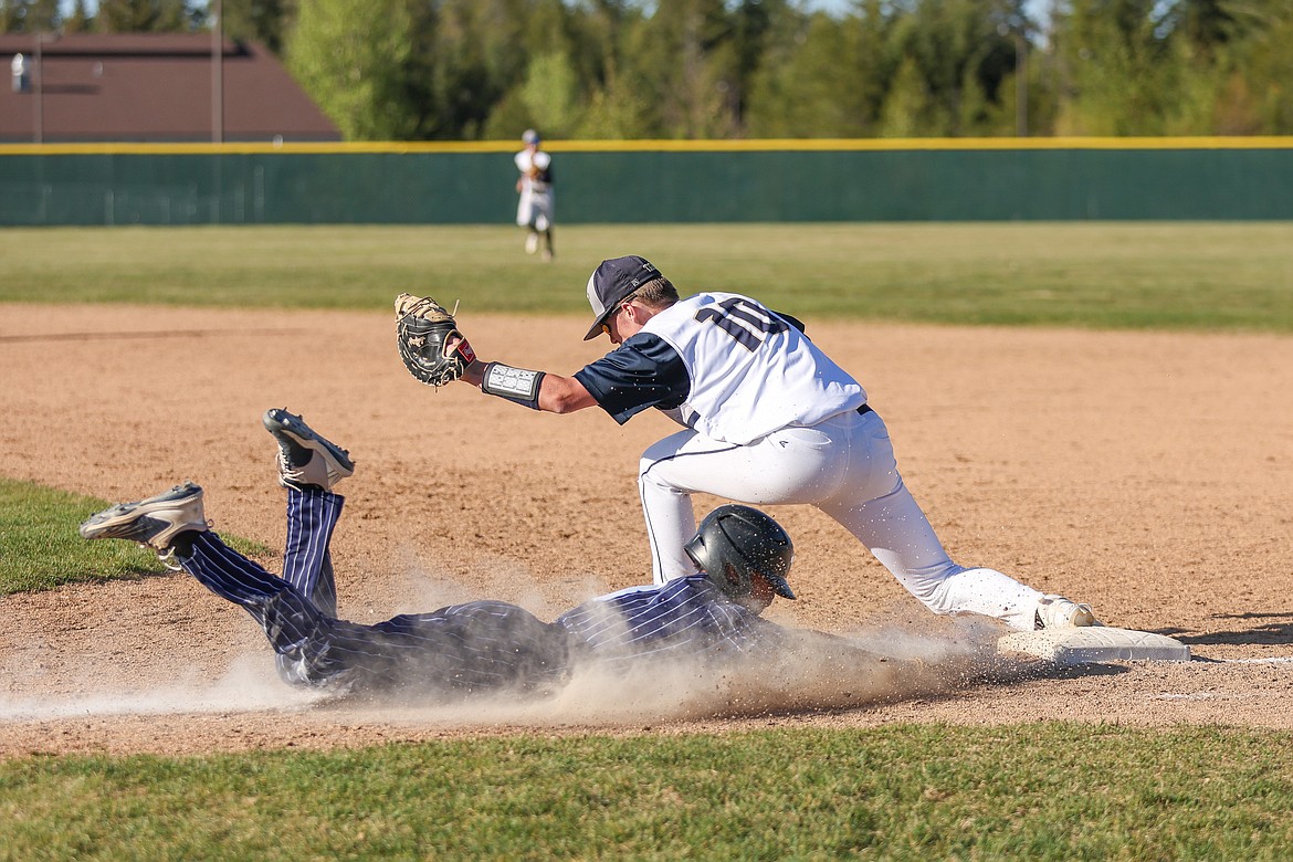 PREP BASEBALL: Pile of happy Tigers ... Timberlake sweeps Bonners Ferry ...