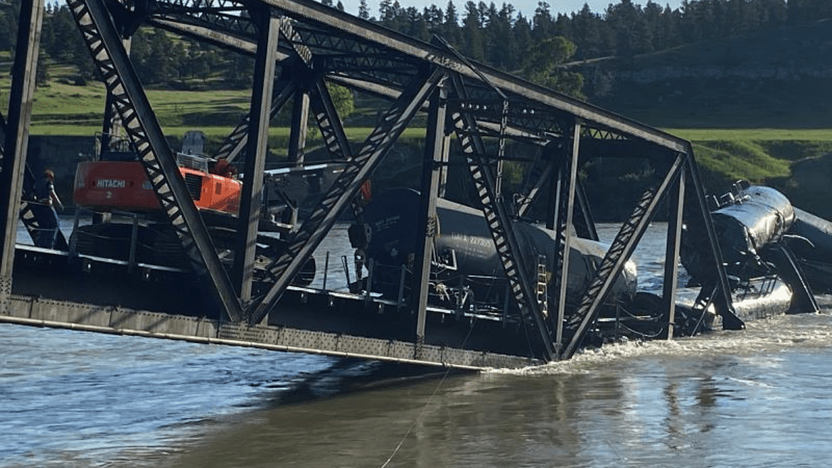 Investigation still in progress after 10 railcars plunged into the ...