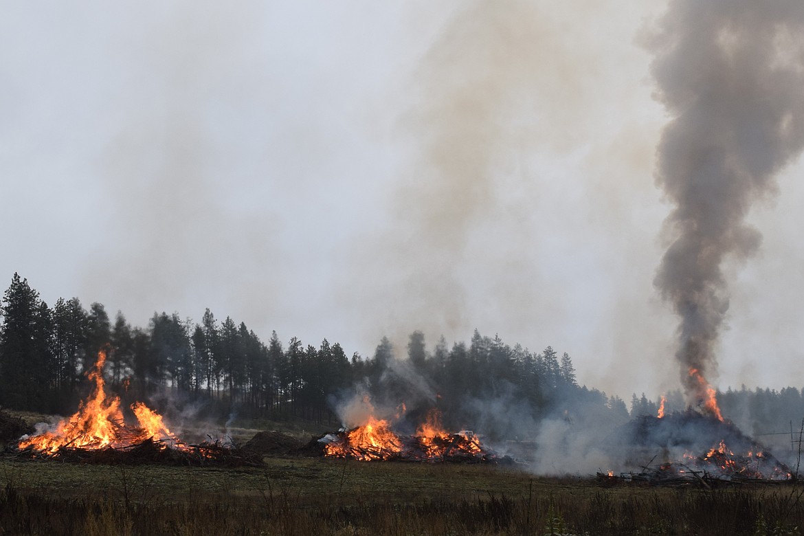 Slash pile burning visible from I-90 in Post Falls | Coeur d'Alene Press
