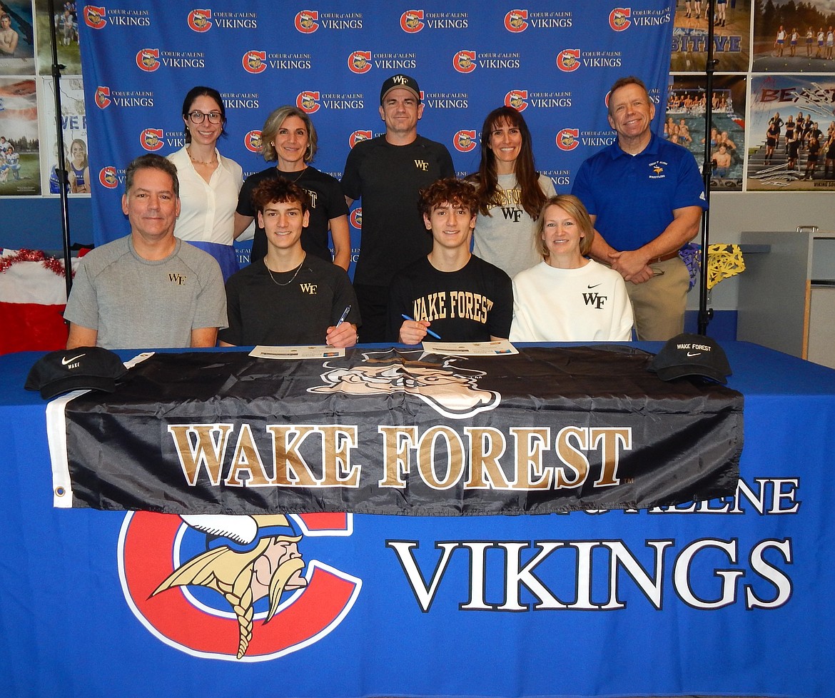 Signing photos Dec. 24, 2024 | Coeur d'Alene Press