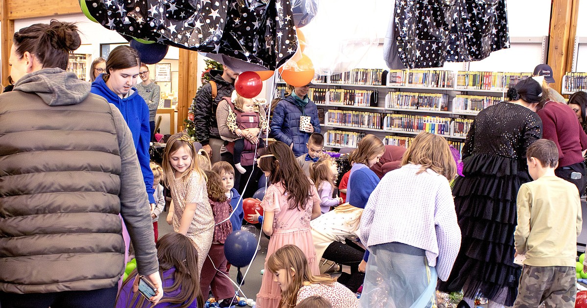 Kids watch balloons drop at the Hayden 'Noon Year's Eve' celebration ...