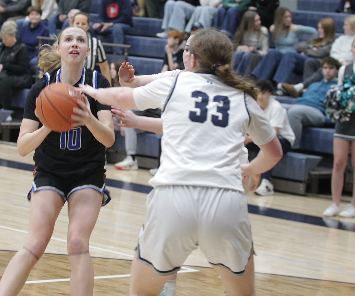 PREP GIRLS BASKETBALL: Coeur d'Alene locks up Lake City, IEL title ...