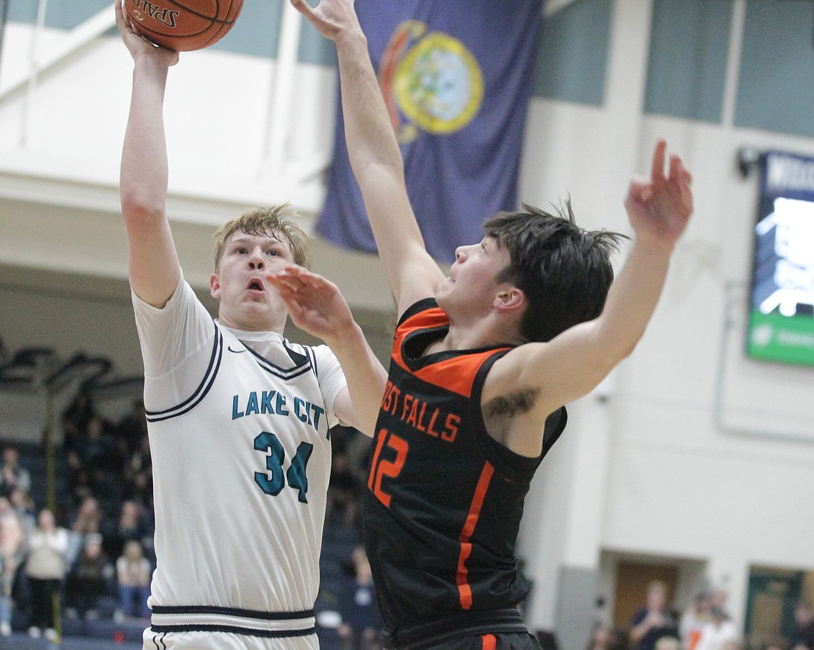 PREP BOYS BASKETBALL: An interesting ending ... Lake City downs IEL ...