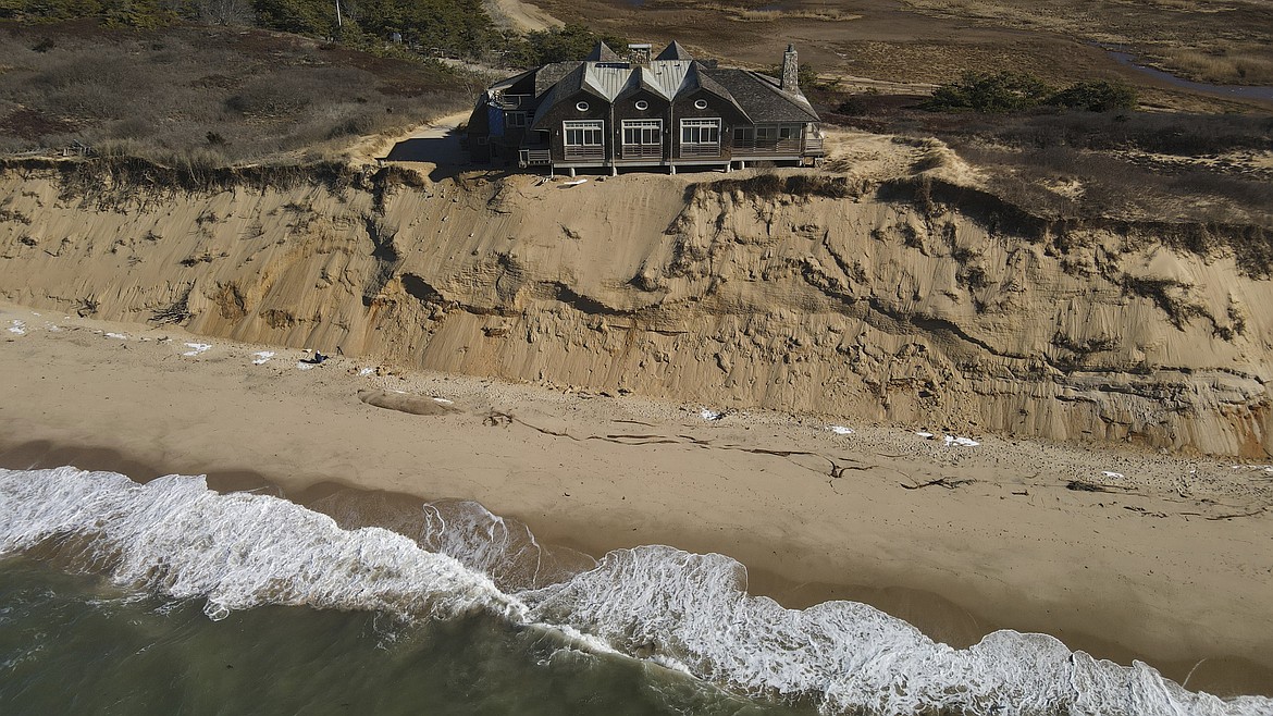A luxury house is close to tumbling into Cape Cod Bay. Will anyone stop ...