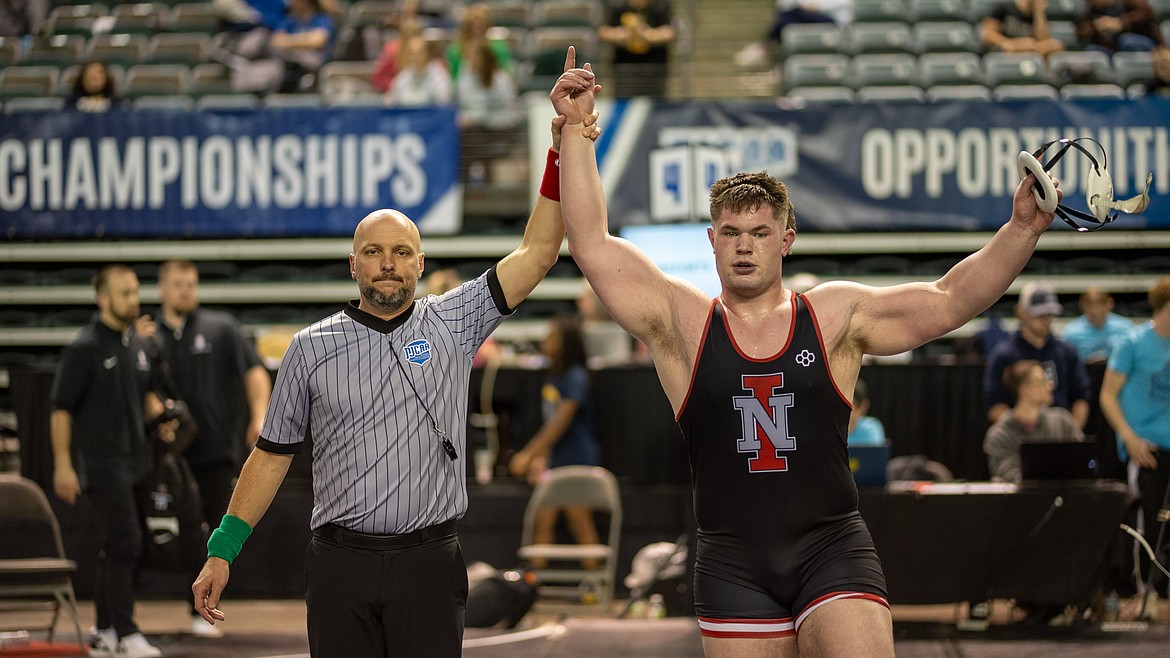 NJCAA WRESTLING TOURNAMENT: Cardinals, with two semifinalists, sit ...