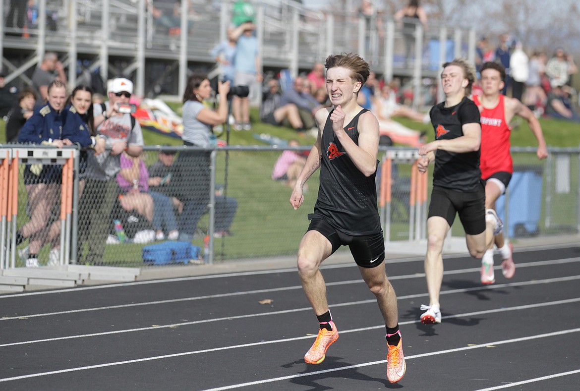 PREP TRACK AND FIELD: Dreams of gold ... Post Falls 4x400 relay members ...