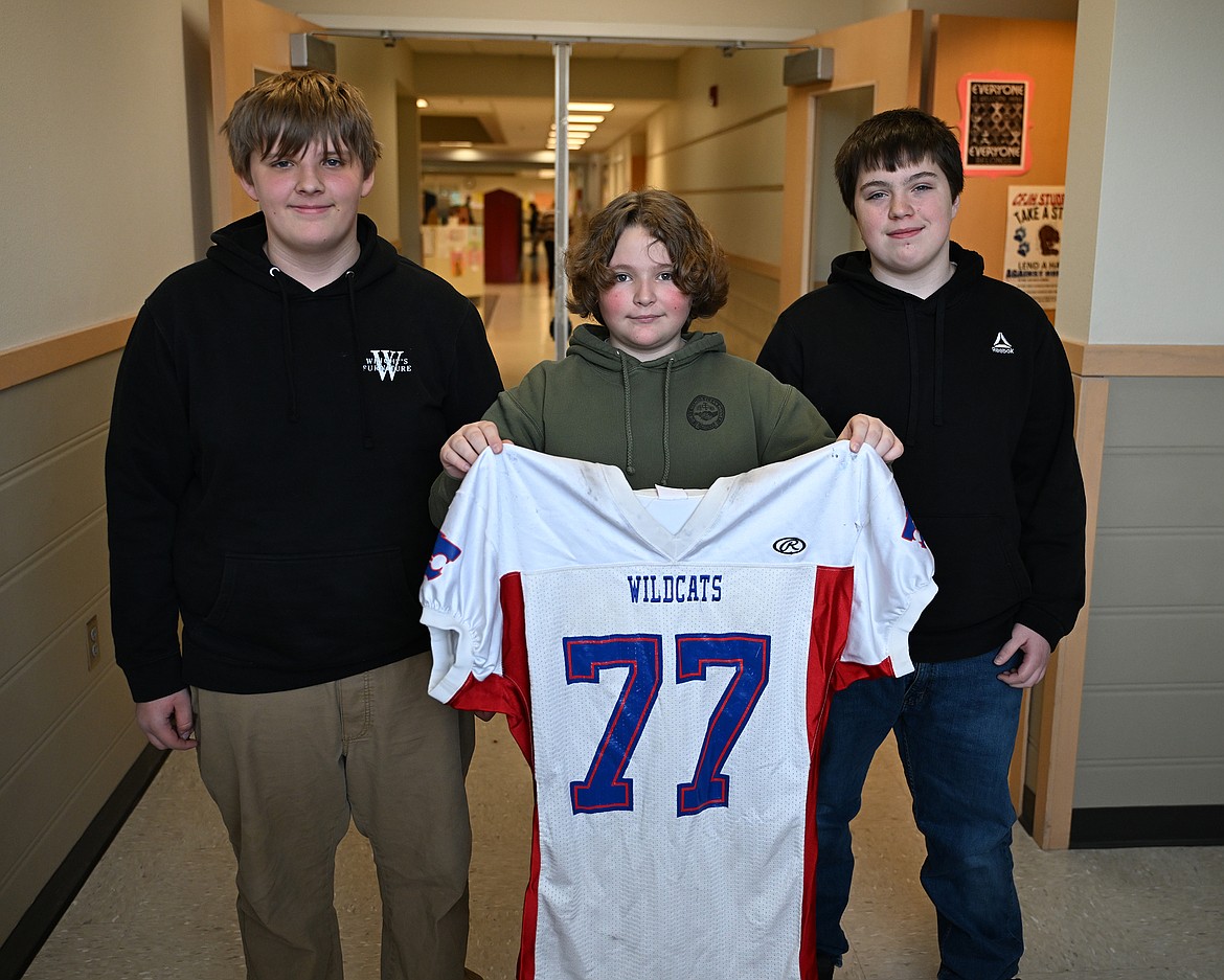 Get a haircut, help out junior high football, at upcoming event ...