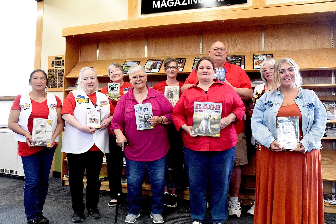 Libby Legion Auxiliary donates military service animal books to library ...