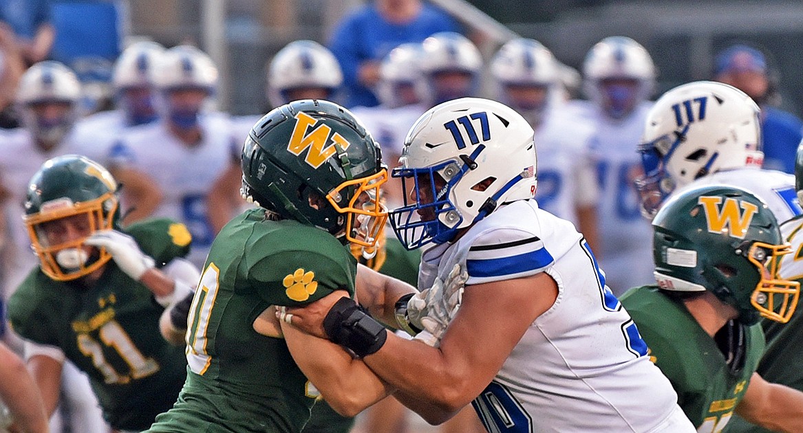 Thunderstorms cancel season-opener football game | Hagadone News Network