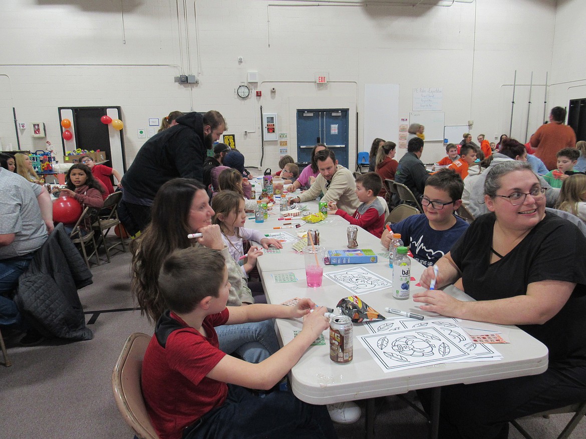 IHE's Turkey Bingo brings families together for night of fun, giving ...