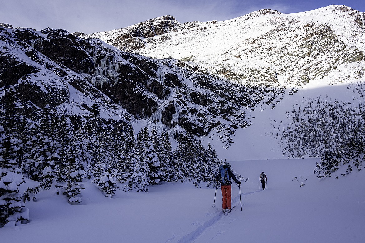 Skiing the desolate slopes of Glacier National Park's Otokomi Lake ...