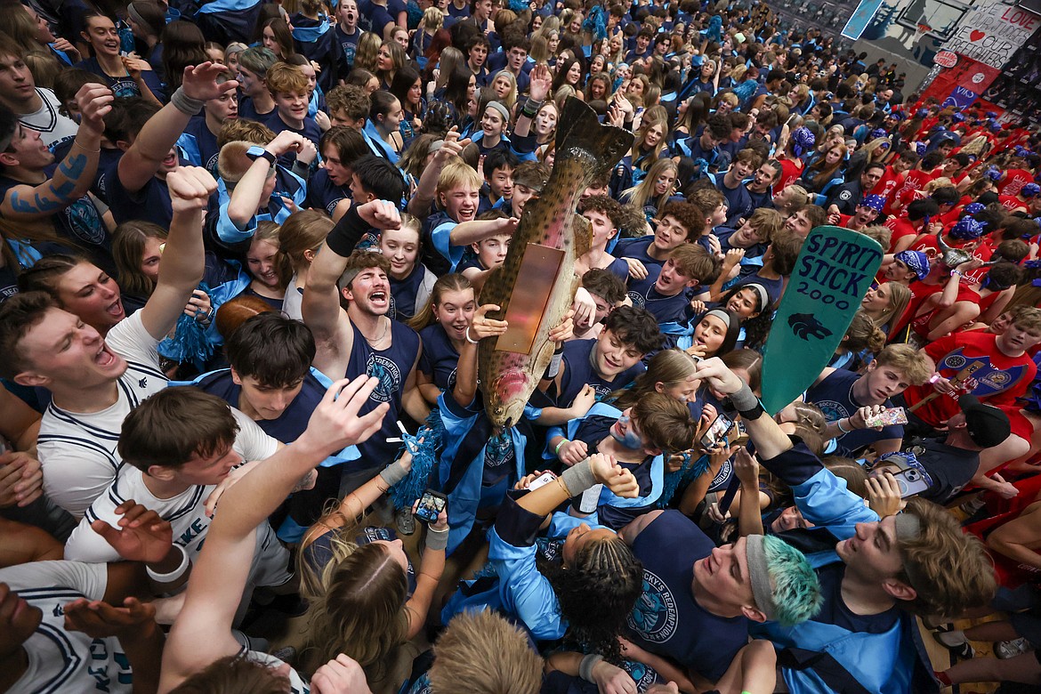 FIGHT FOR THE FISH: Lake City boys run past Coeur d'Alene; Viking girls ...