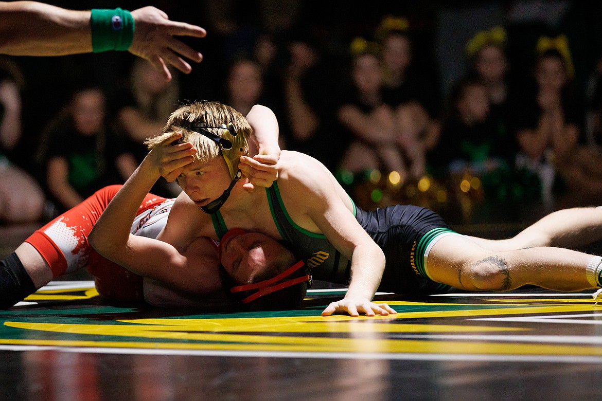 PREP WRESTLING: Coeur d'Alene seventh after first day in Missoula ...