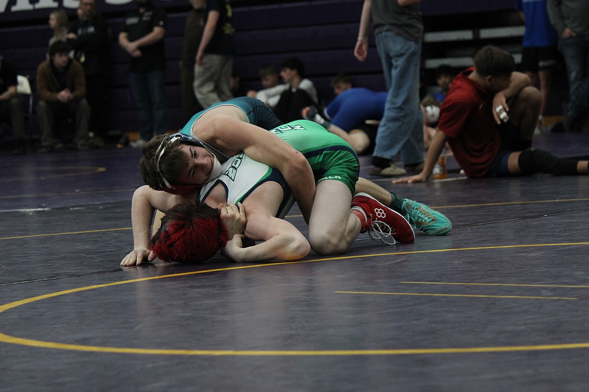 PREP WRESTLING: Coeur d'Alene seventh after first day in Missoula ...