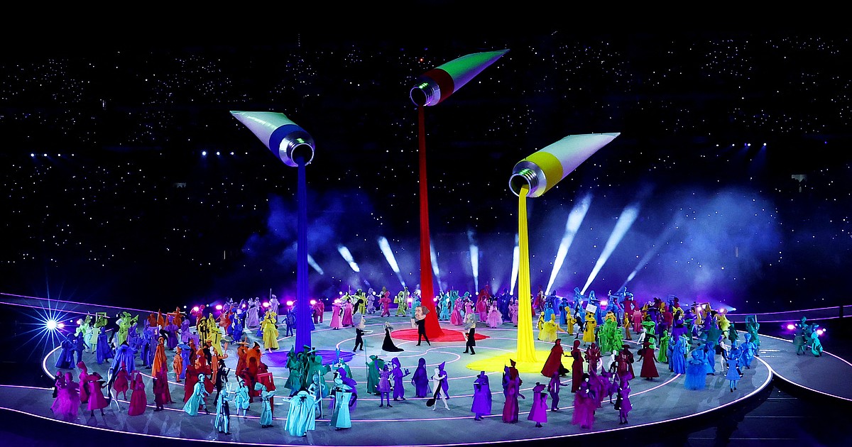 Olympians march in Milan and the mountains at a multi-site opening ...